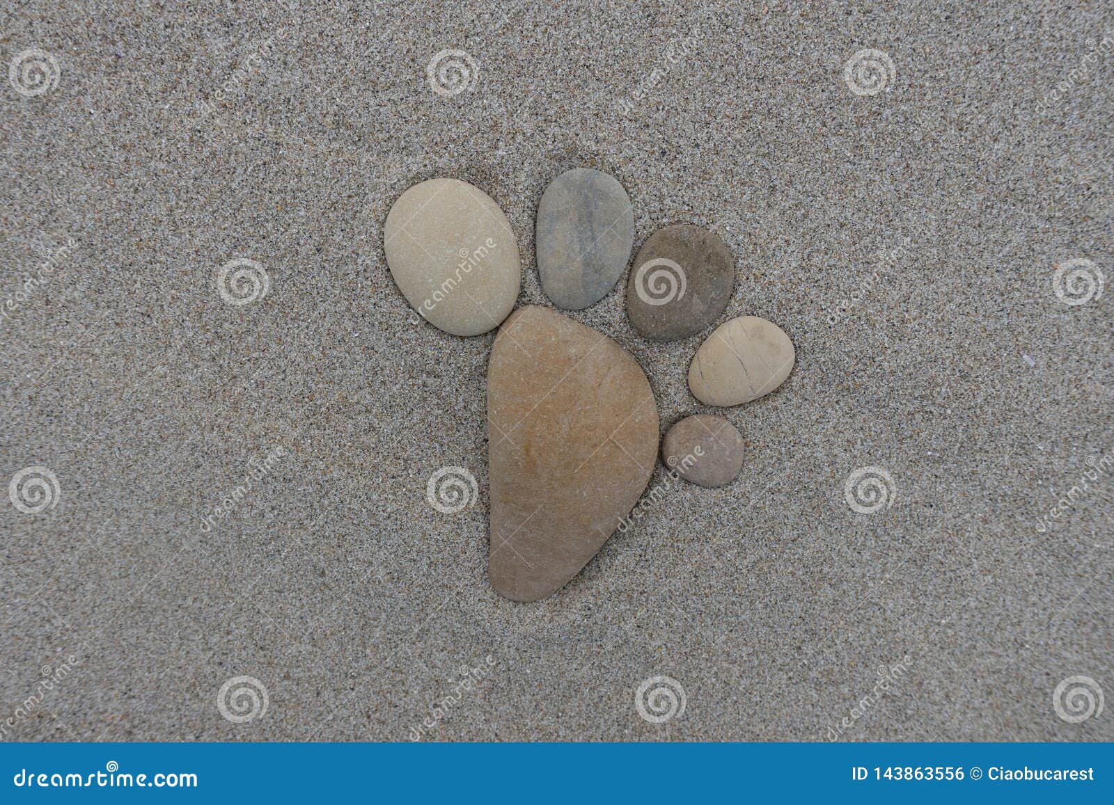 Creative Foot Composed with Pebbles Over Beach Sand Stock Photo - Image ...
