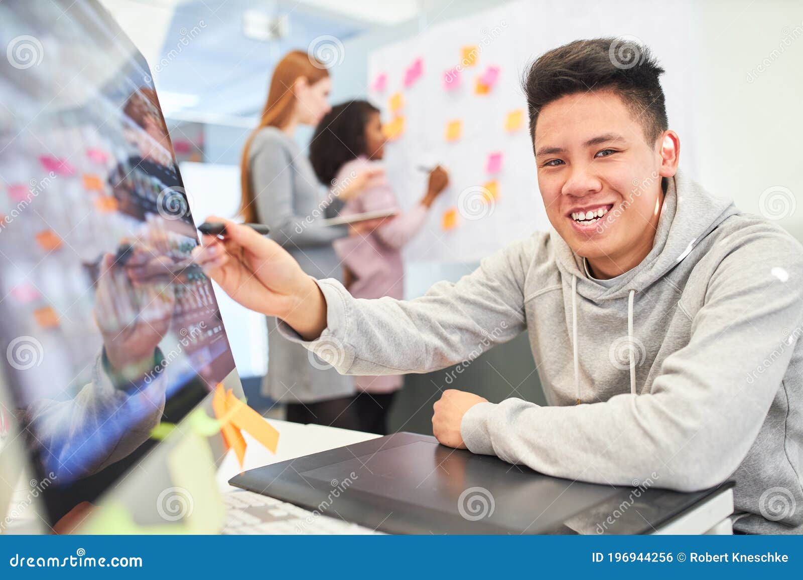 Creative Graphic Designer is Happy about an Idea Stock Photo - Image of ...
