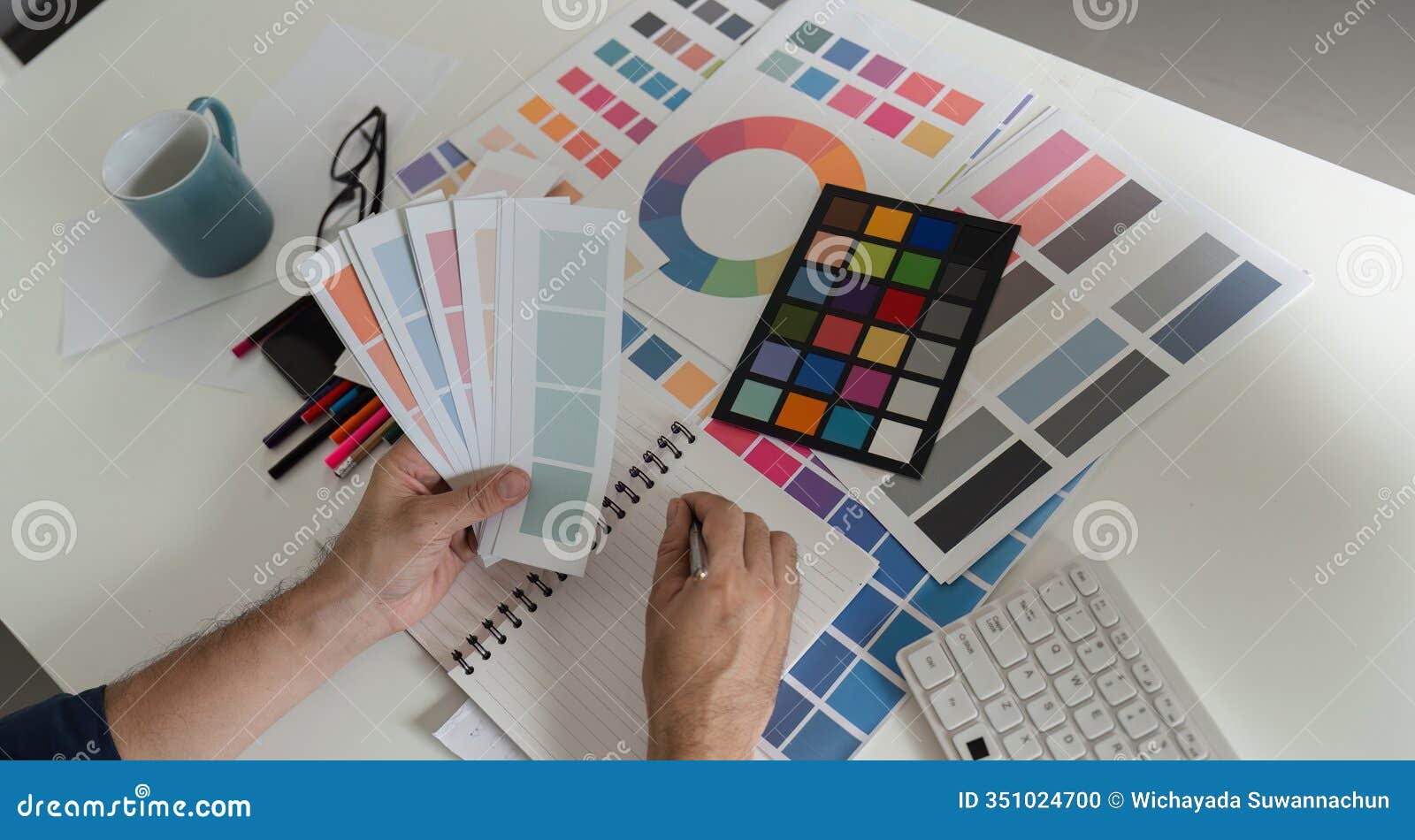 Creative Graphic Designer Selecting Color Palettes for Innovative ...