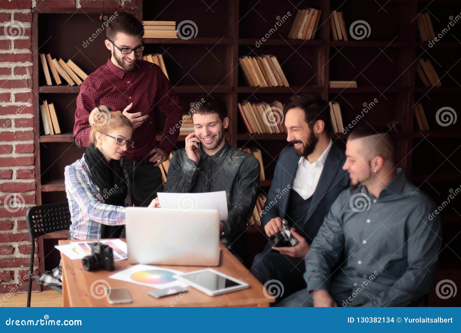 Creative Group of Designers at a Working Meeting in the Studio. Stock ...