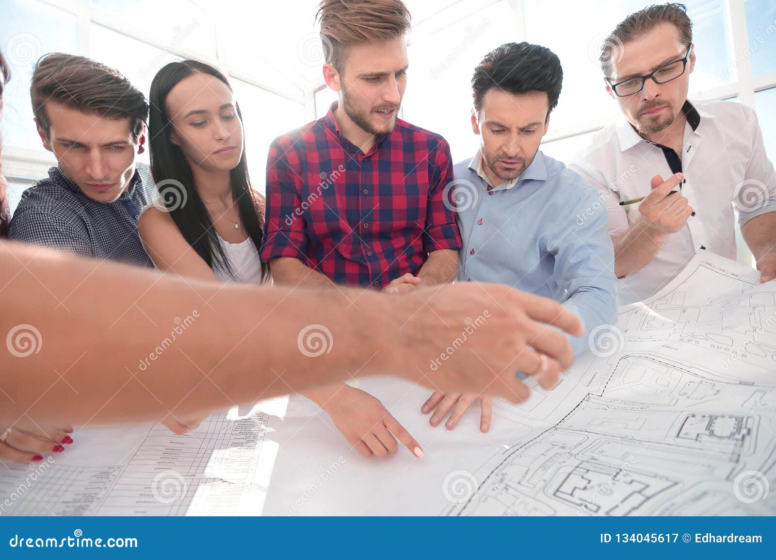 Creative Group of Young Architects, Showing You Stock Image - Image of ...