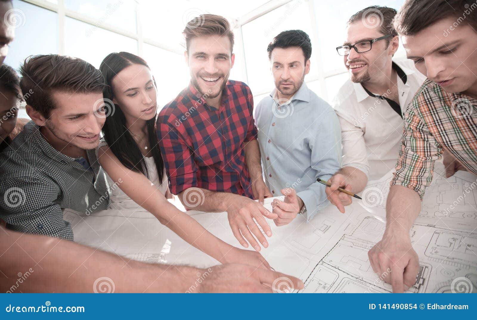 Creative Group of Young Architects, Showing You Stock Photo - Image of ...