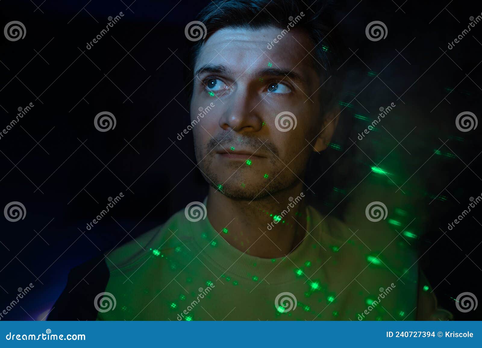 Creative Idea, Concept. Young Man and a Projection of Colored Patterns ...