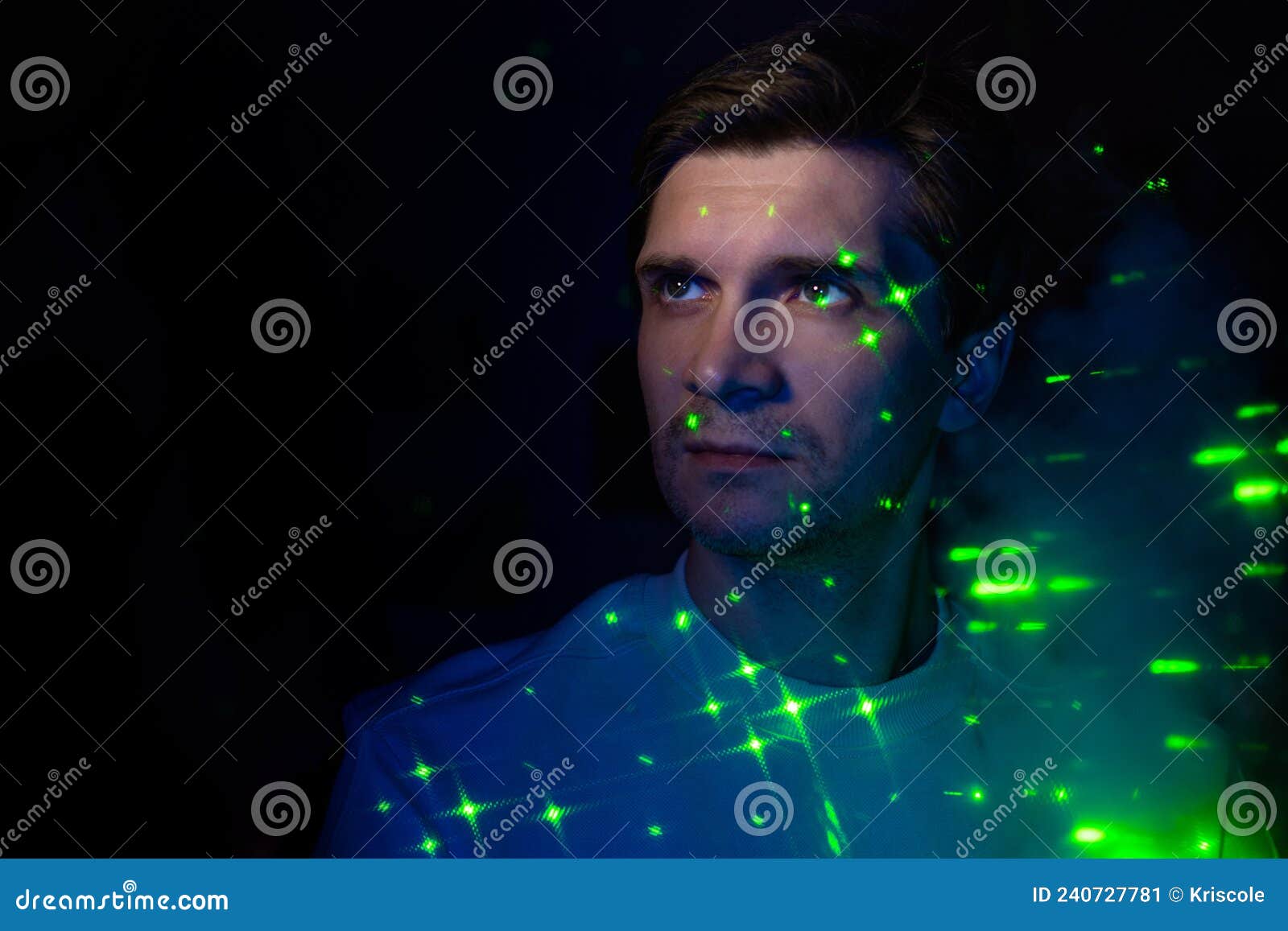 Creative Idea, Concept. Young Man and a Projection of Colored Patterns ...