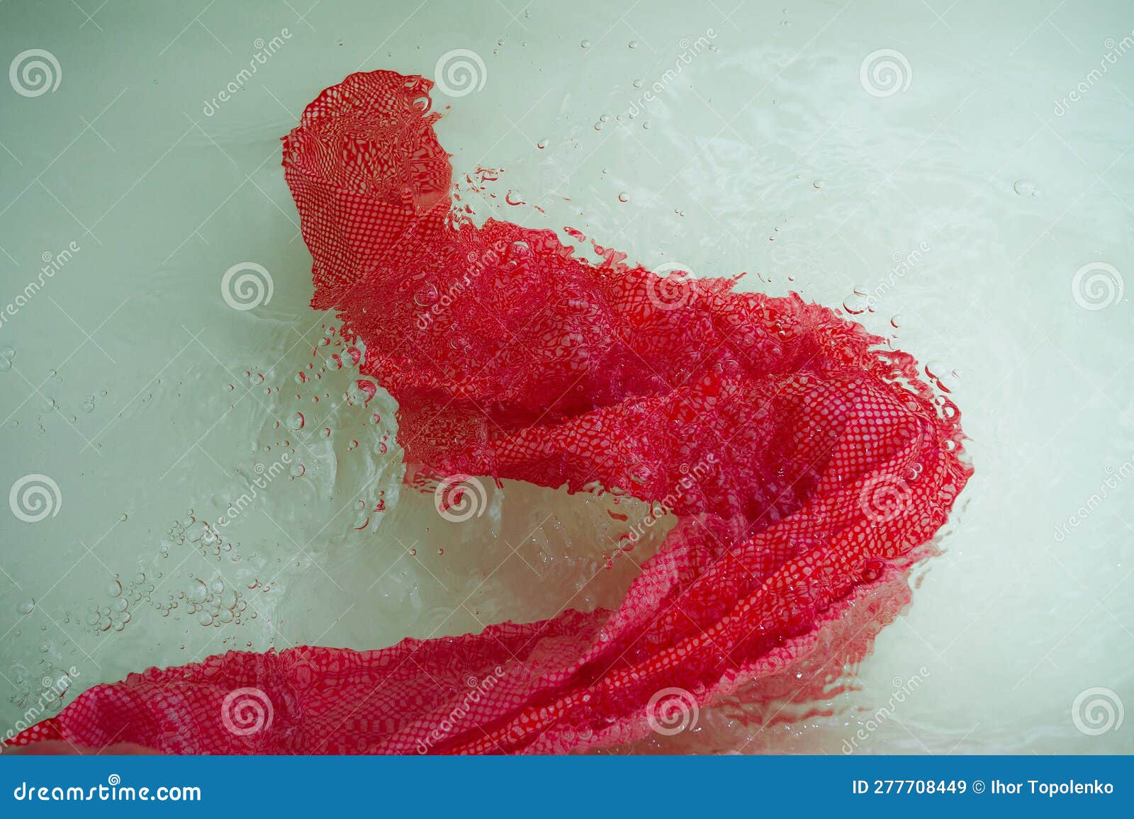 Creative Image of Wet Crumpled Red Material with White Circles ...