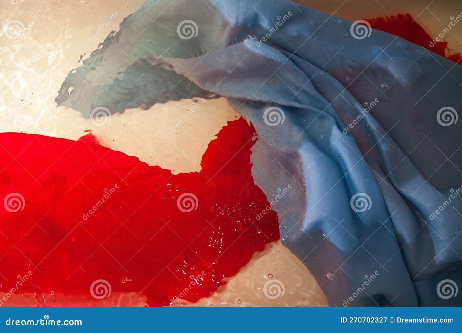 Creative Image of Wet Red and Blue Rumpled Material in Water with Waves ...