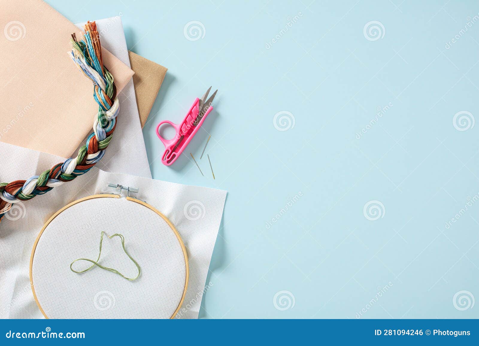 Creative Layout with Embroidery Materials on Blue Background Stock ...