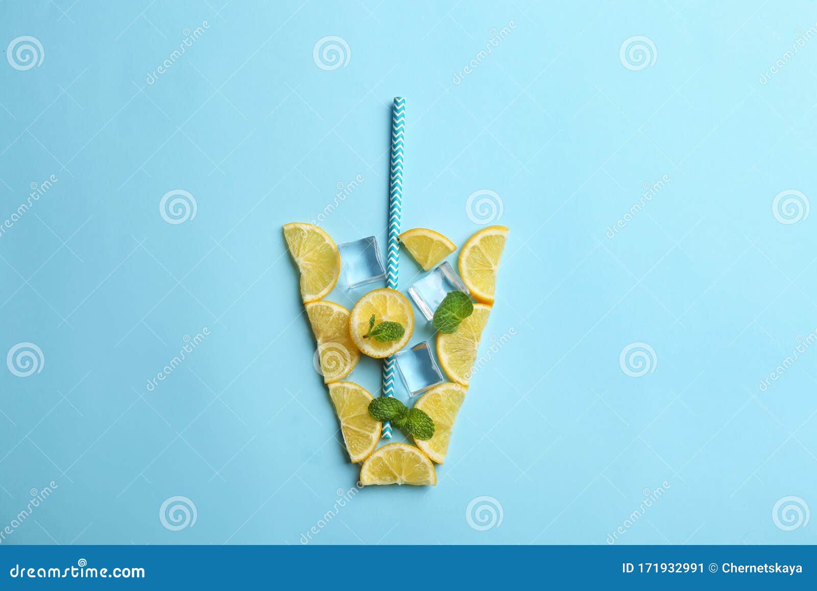 Creative Lemonade Layout with Lemon Slices, Mint and Ice on Blue ...