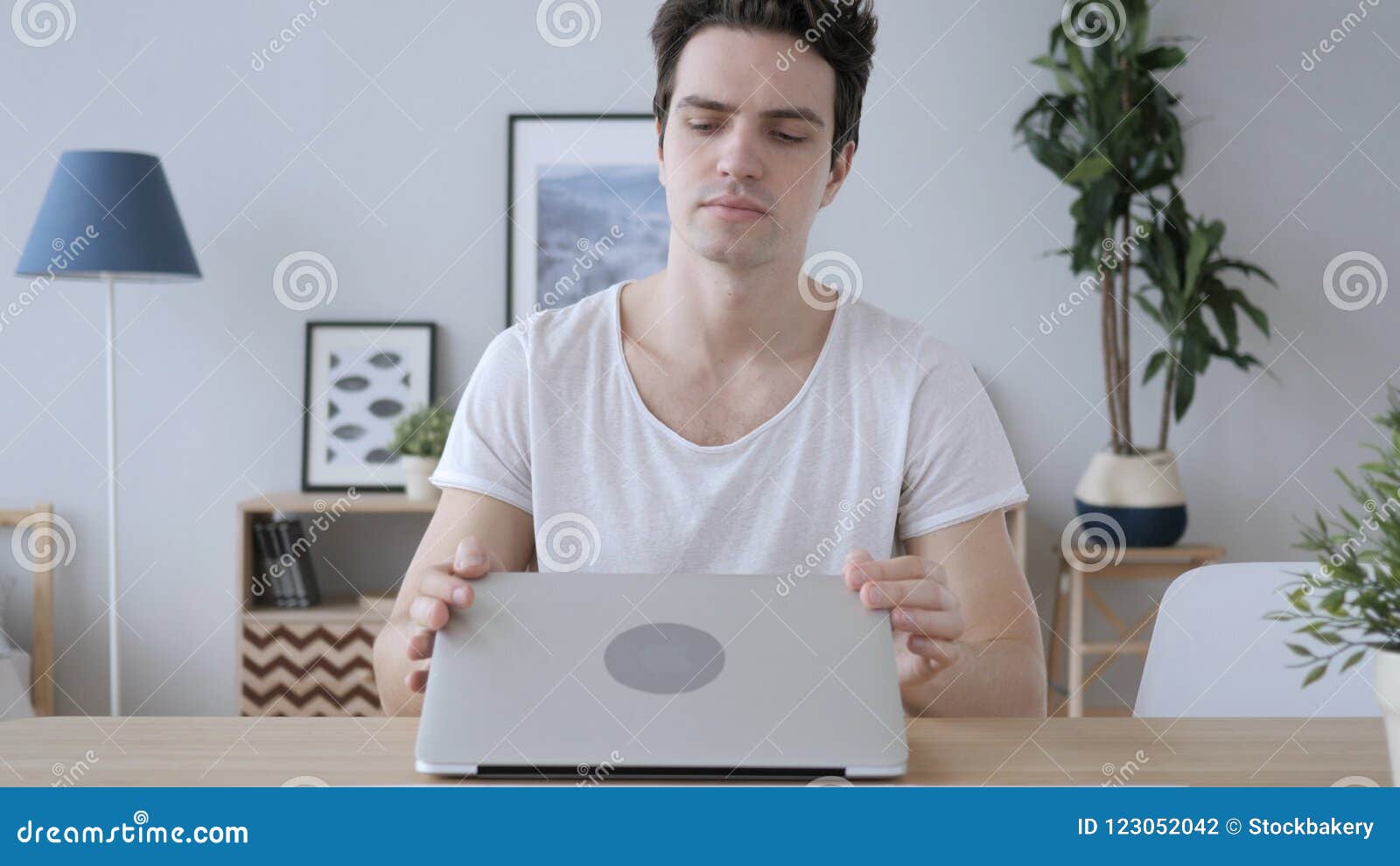 Creative Man Closing Laptop in Office after Work Stock Photo - Image of ...