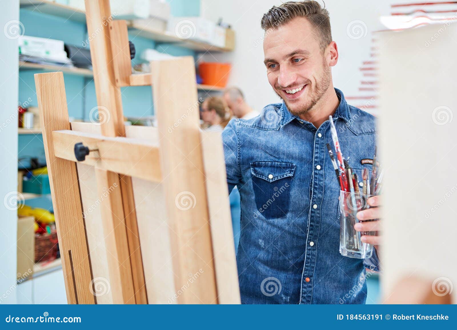 Creative Man when Painting on Canvas on Easel Stock Image - Image of ...