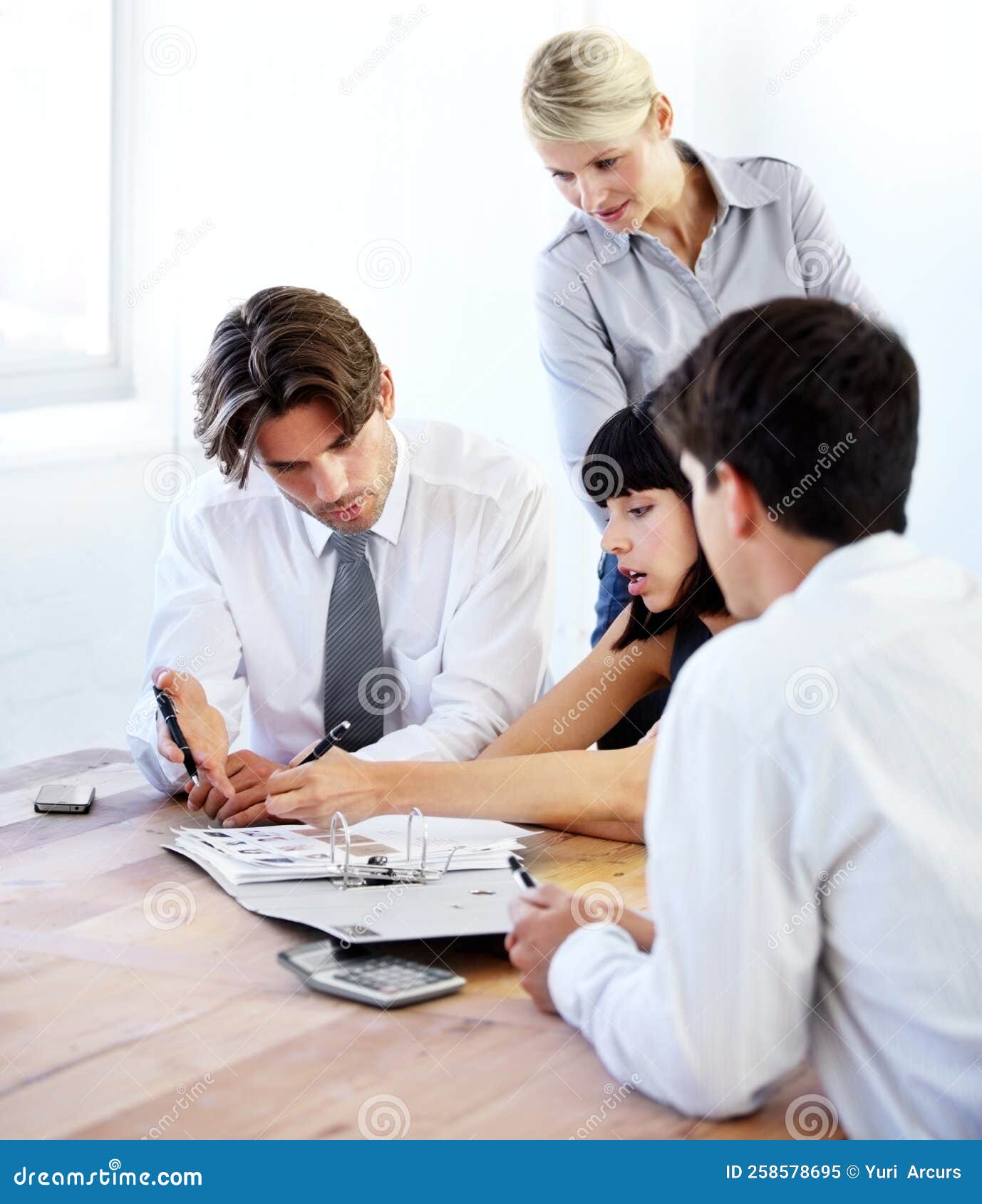 Creative Minds at Work. Group of Businesspeople Working Together As a ...