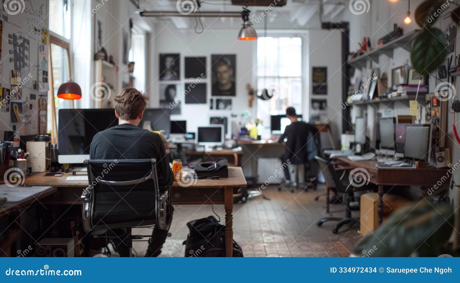 Creative Modern Office Space with Designers Working on Computers in ...
