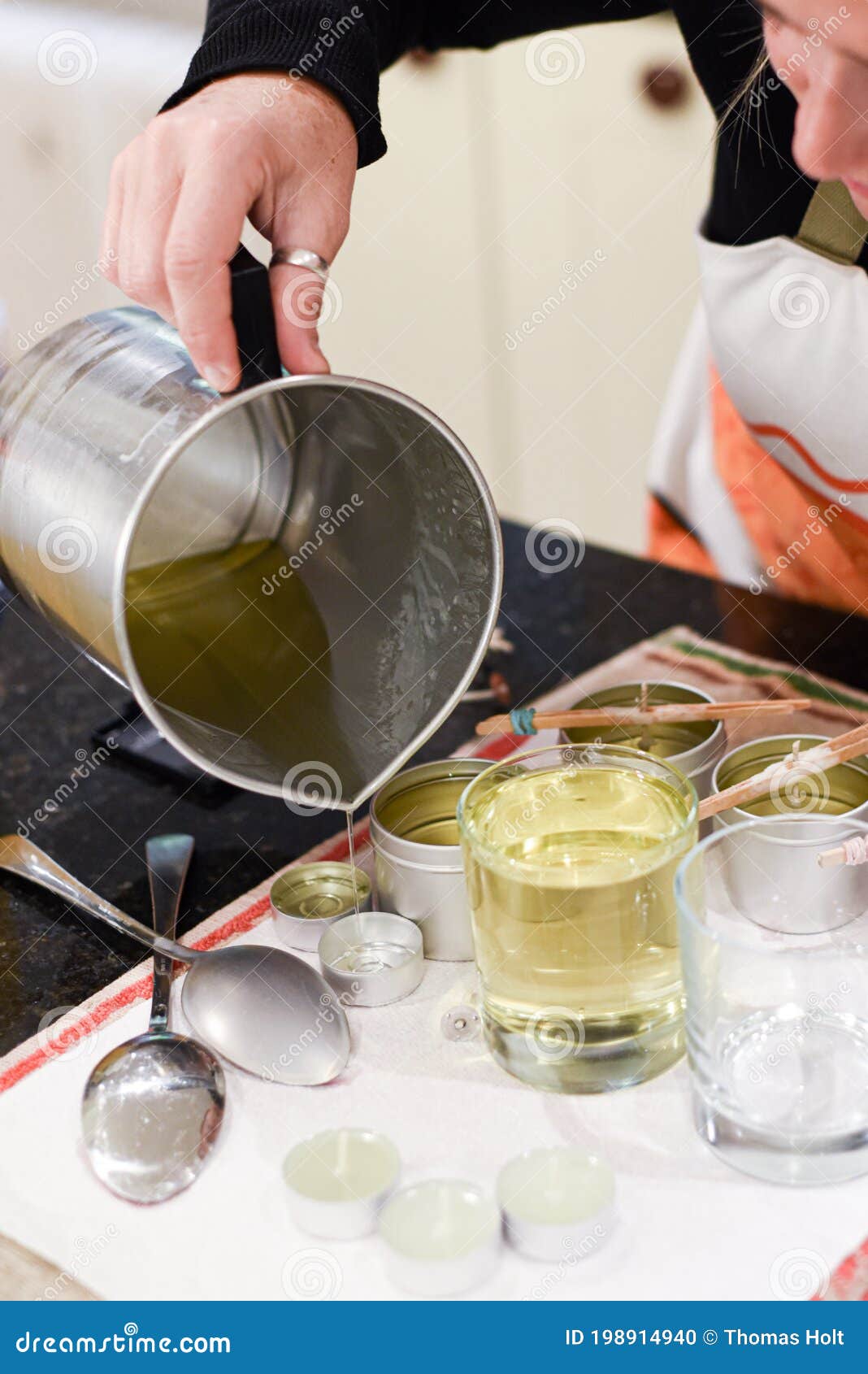 Creative Occupation of Candle Making Showing the Pouring of Liquid Wax ...