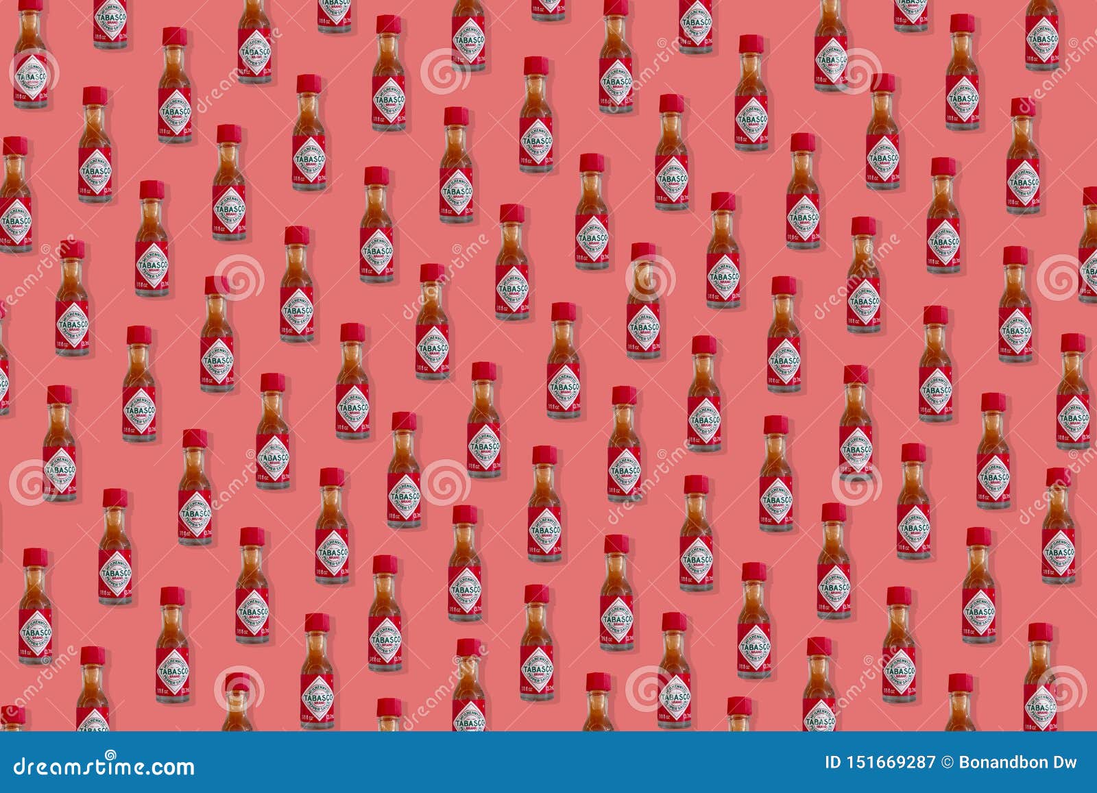 Creative Pattern Made of Mini Bottle of Tabasco Chili Pepper Sauce ...