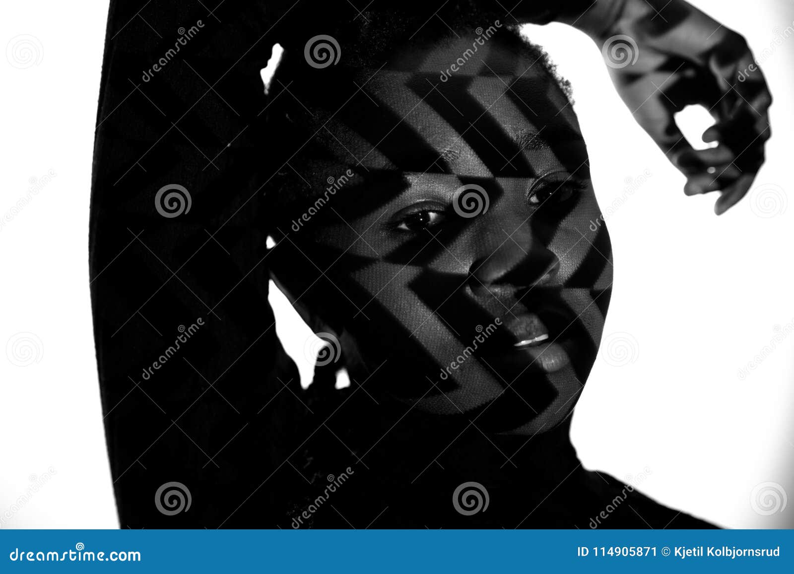 Creative Pattern from Projection Light on Beautiful Woman with Dark ...