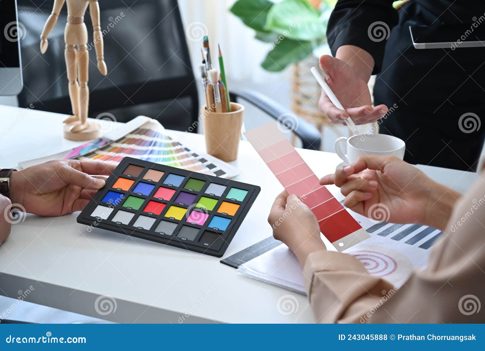 Creative People Using Color Swatches and Working in Design Studio ...