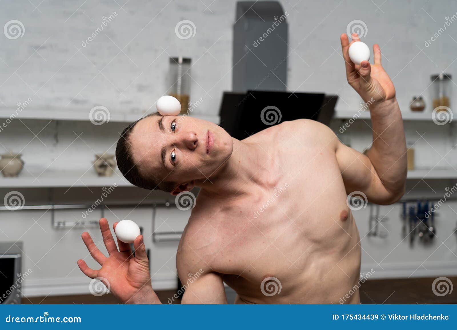 Creative Photo of Muscular Man in the Kitchen Cooking Eggs Stock Image ...