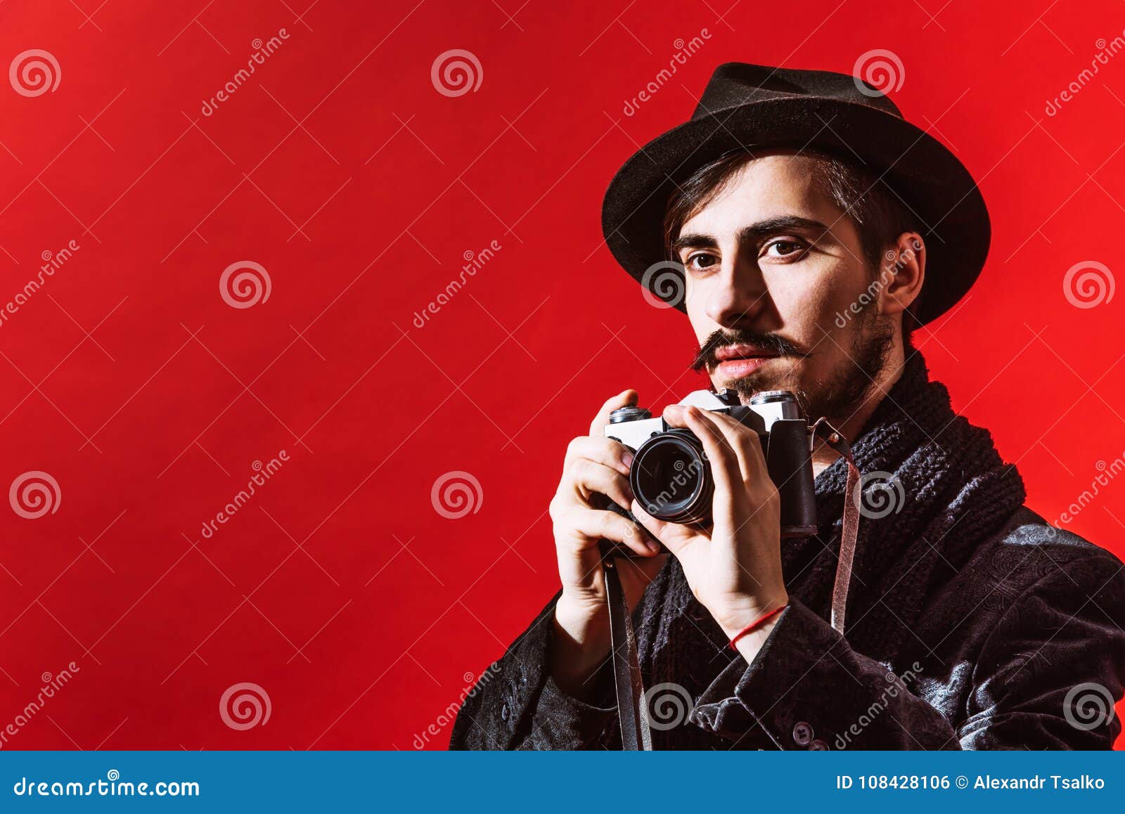 Creative Photographer Posing in Studio with Camera Stock Photo - Image ...