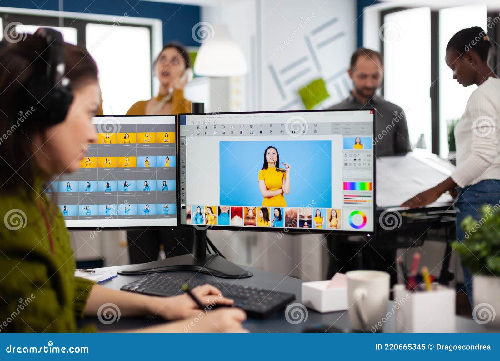 Creative Photographer Using Digital Retouching Program, Wearing Headset ...