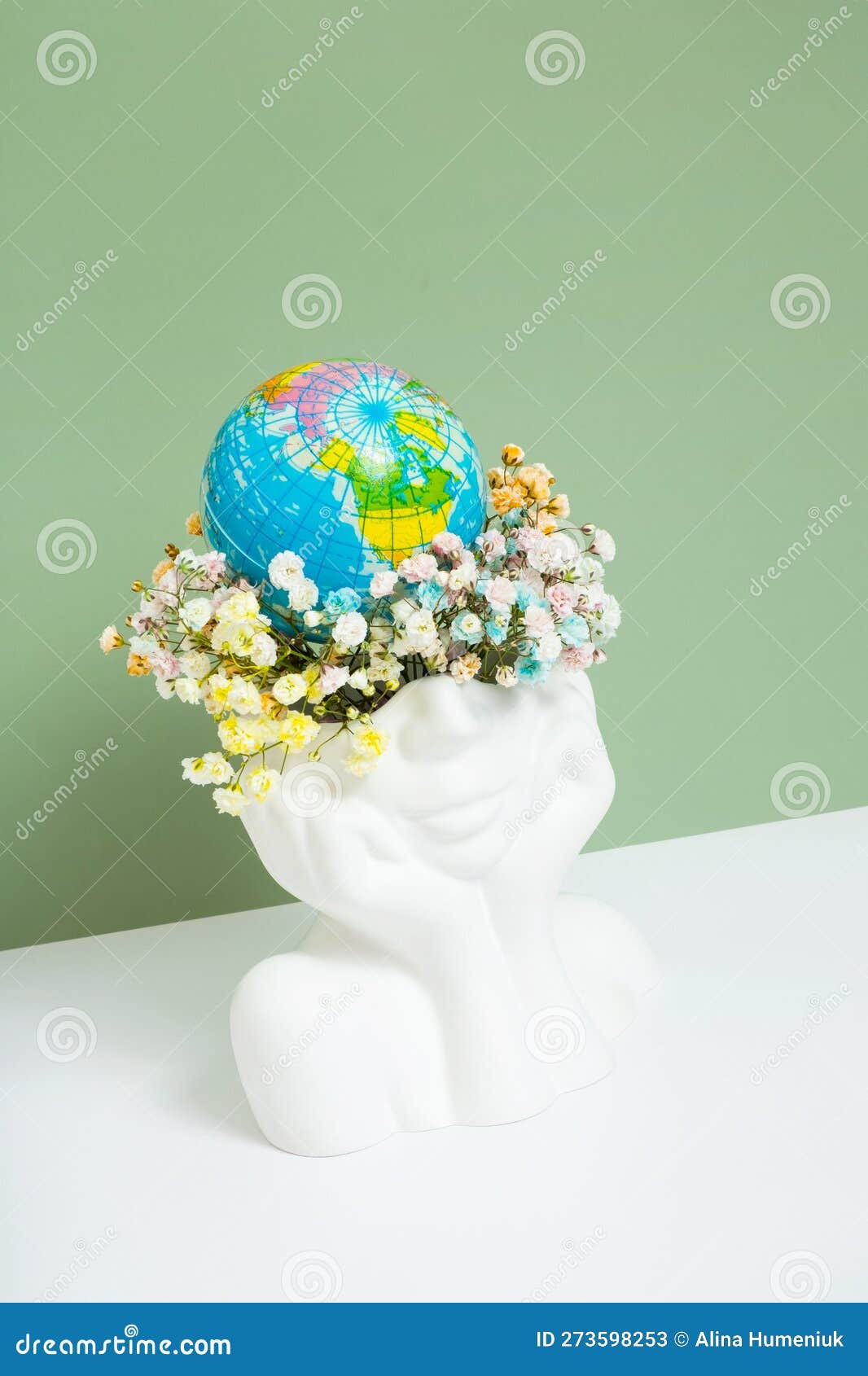 Creative Plaster Vase Head-shape with Flowers and World Globe. Save the ...