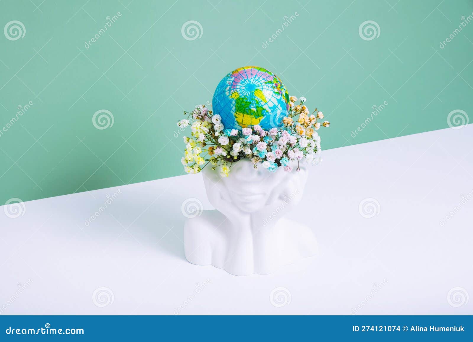 Creative Plaster Vase Head-shape with Flowers and World Globe. Save the ...