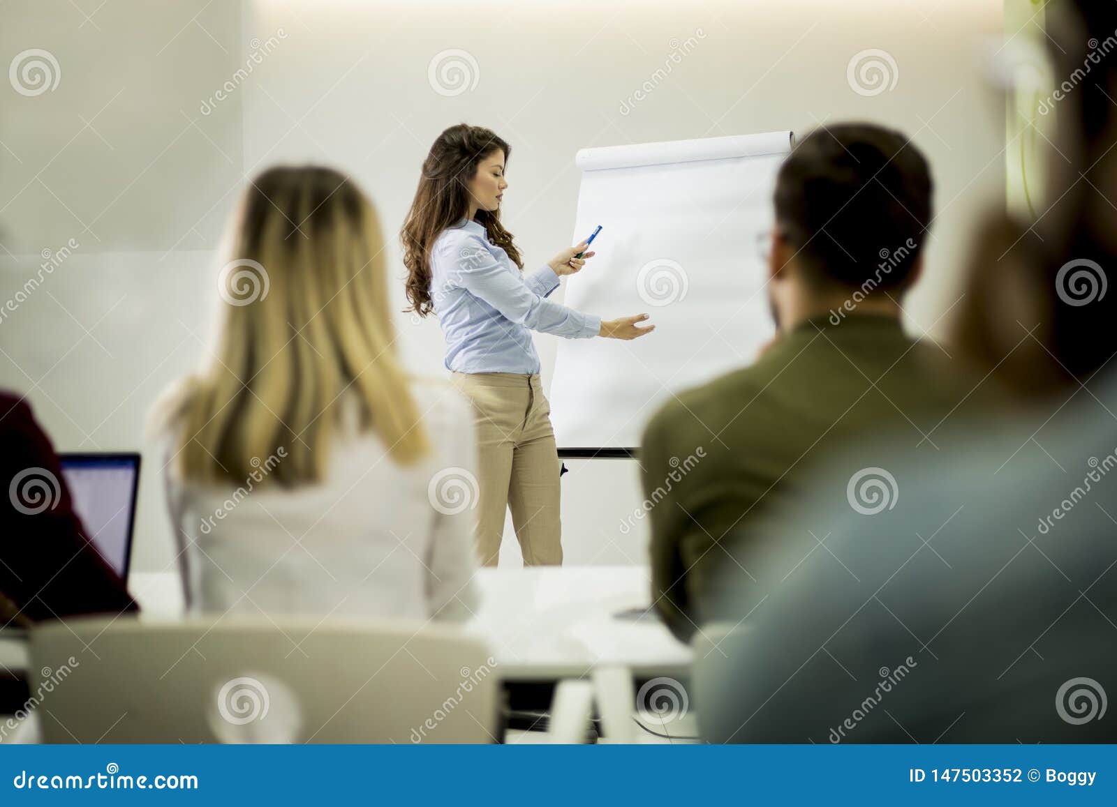 Creative Positive Female Leader Talking about Business Plan with ...