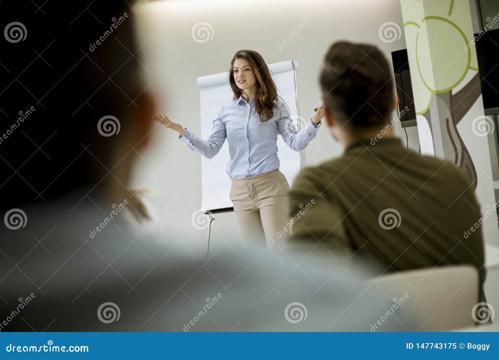 Creative Positive Female Leader Talking about Business Plan with ...