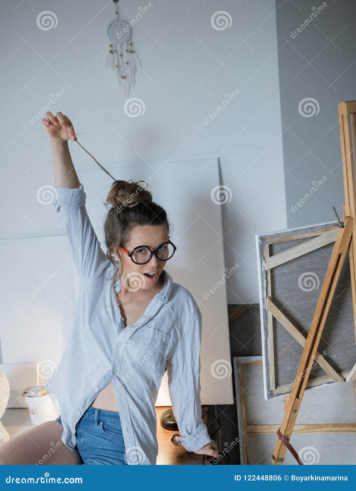 Creative Pretty Woman Painter in Front of the Canvas and Drawing Stock ...