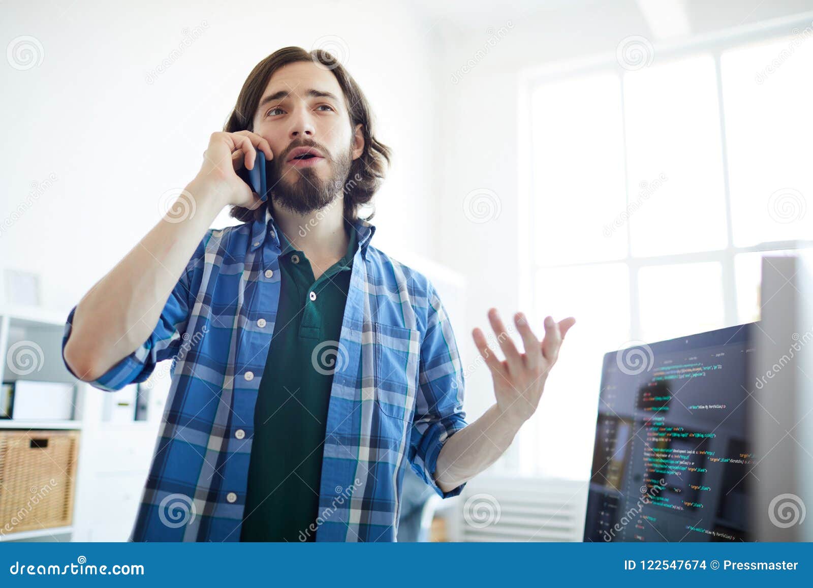 Creative Programmer Talking To Customer on Phone Stock Photo - Image of ...