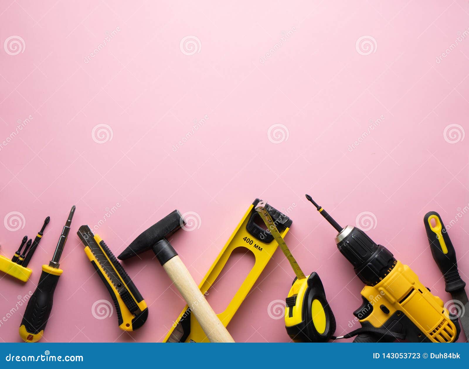 Creative Provocation: a Flat Layout of Yellow Hand Tools on a Pink ...