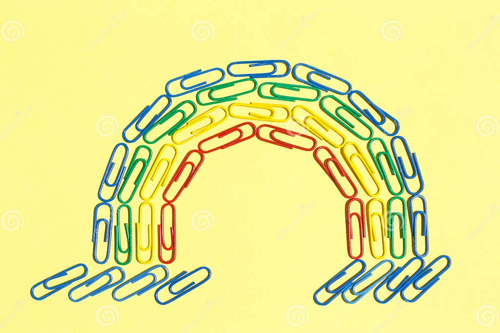 Creative Rainbow of Colored Paper Clips Stock Illustration ...