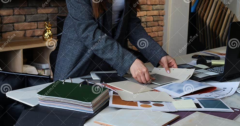 Creative Session with Architect Discussing Project Layouts ...