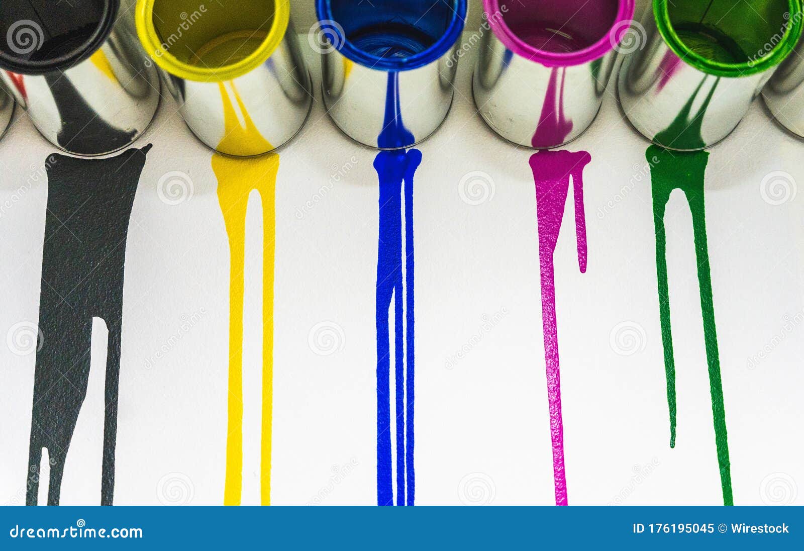 Creative Shot of Paint Dripping from Paint Cans on a White Background ...