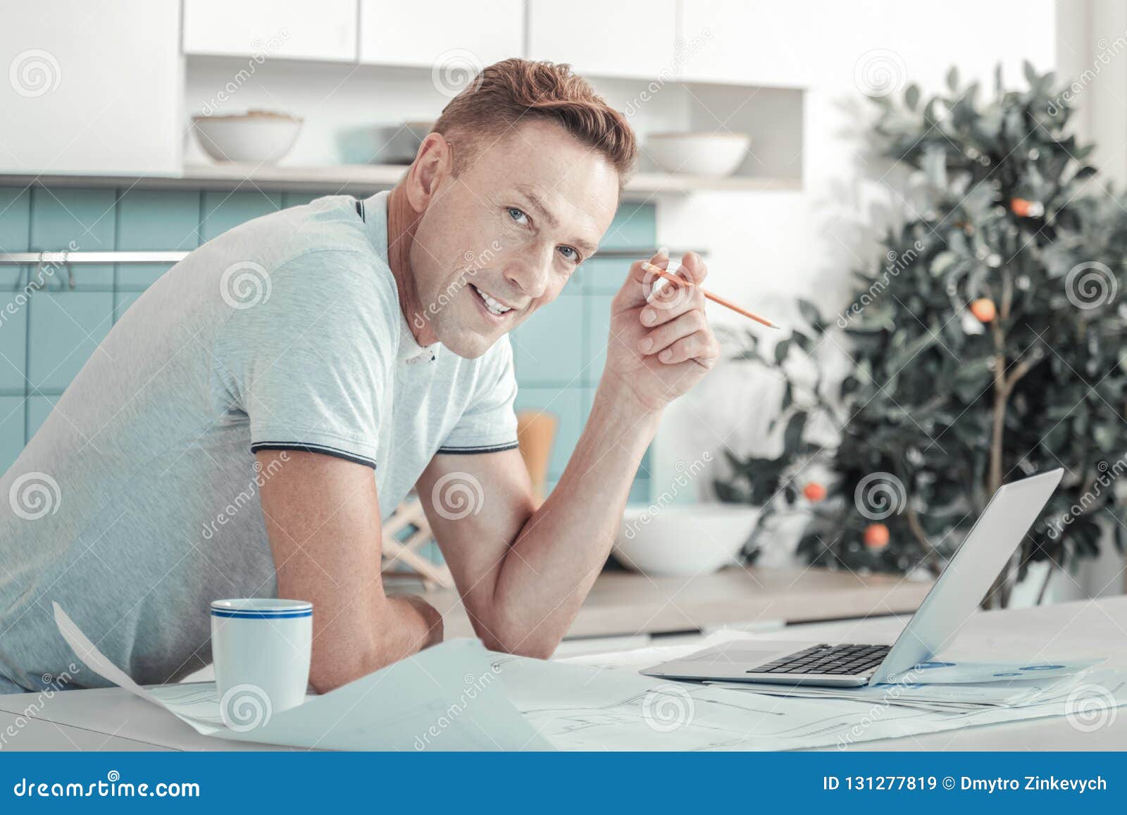 Creative Smart Man Smiling and Standing Opposite the Laptop. Stock ...