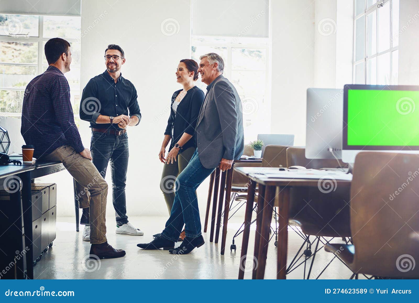 Creative Solutions is Our Goal. a Group of Designers Having a ...