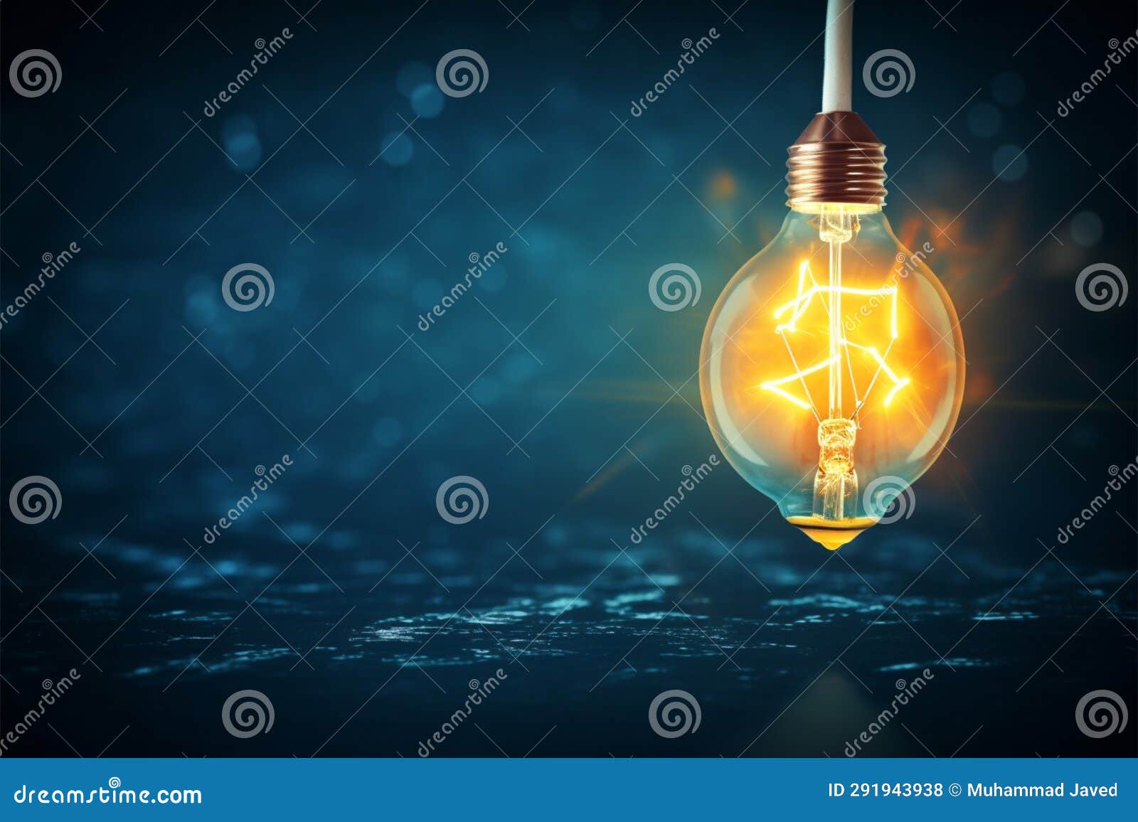 Creative Spark Light Bulb Against a Blue Background with Text Space ...