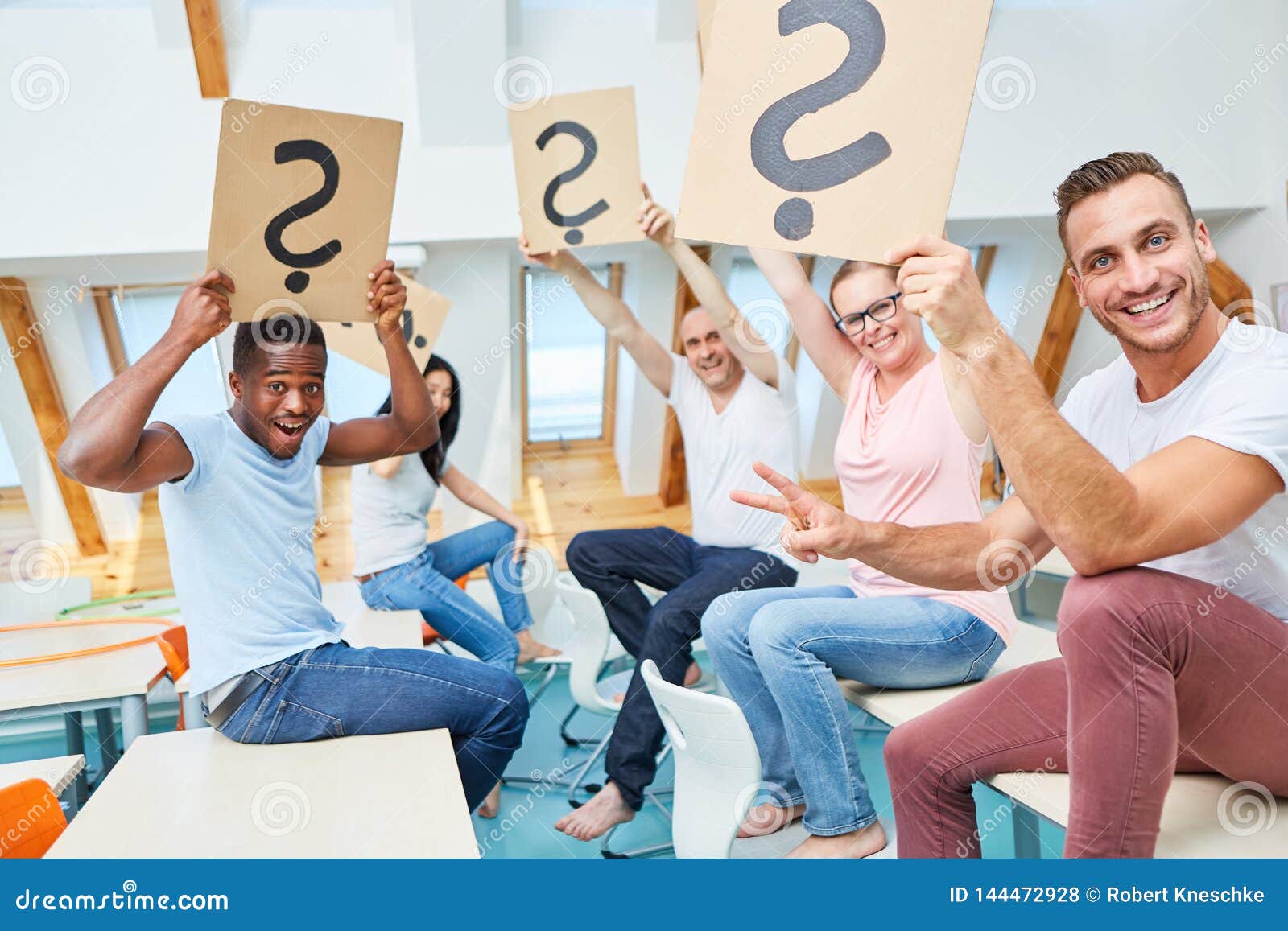 Creative Start-up Team with Question Mark Cheers Stock Photo - Image of ...