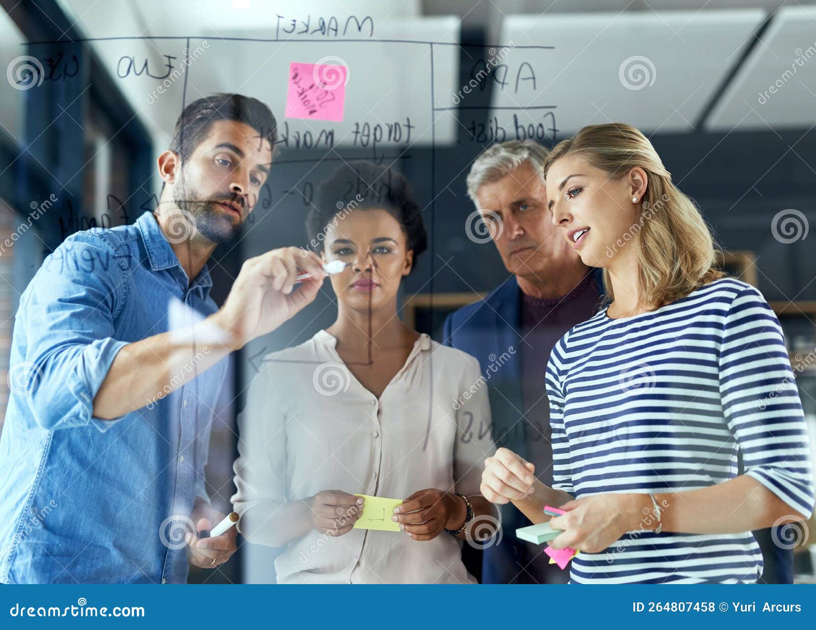 Creative Strategists Hard at Work. a Group of Colleagues Having a ...