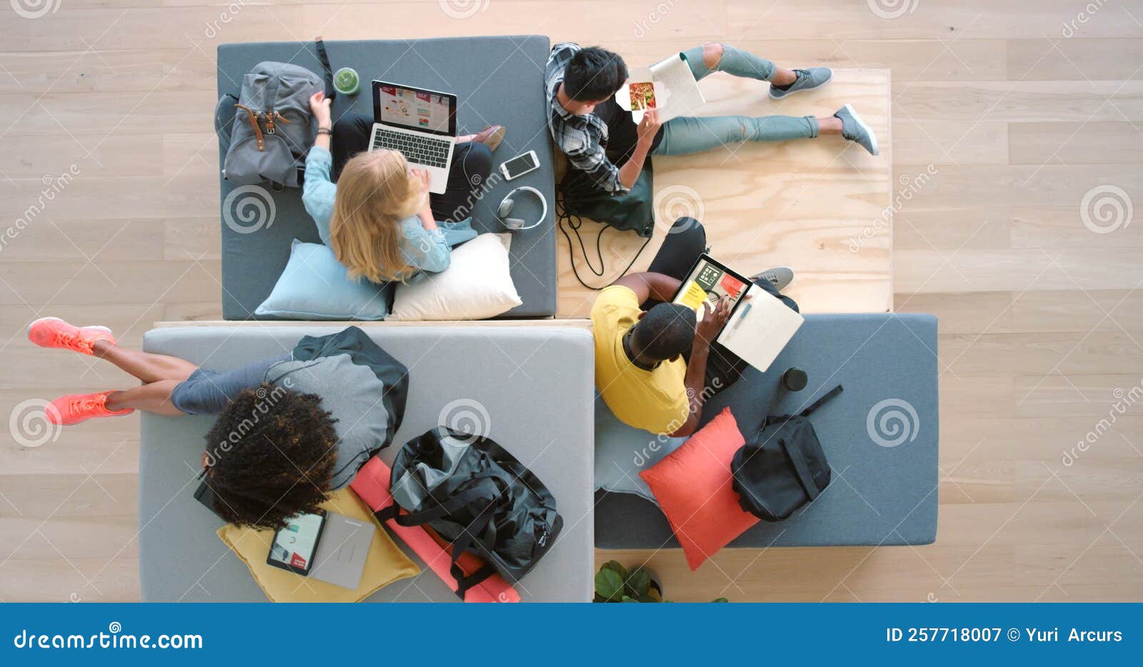 Creative Students Working on Multimedia Technology on Sofa or Lounge at ...