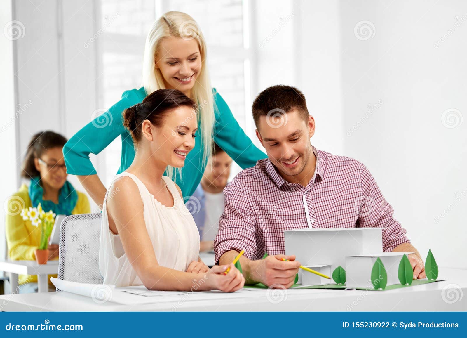 Creative Team with Blueprint Working at Office Stock Photo - Image of ...