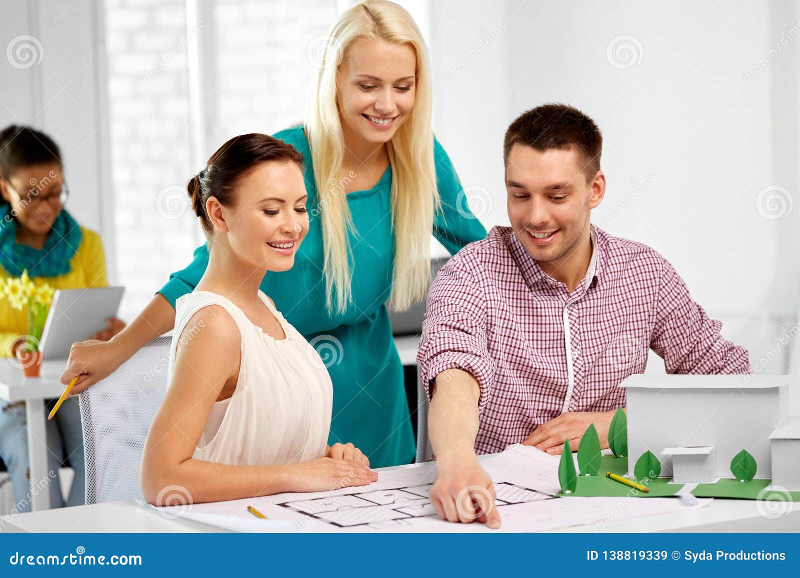 Creative Team with Blueprint Working at Office Stock Image - Image of ...