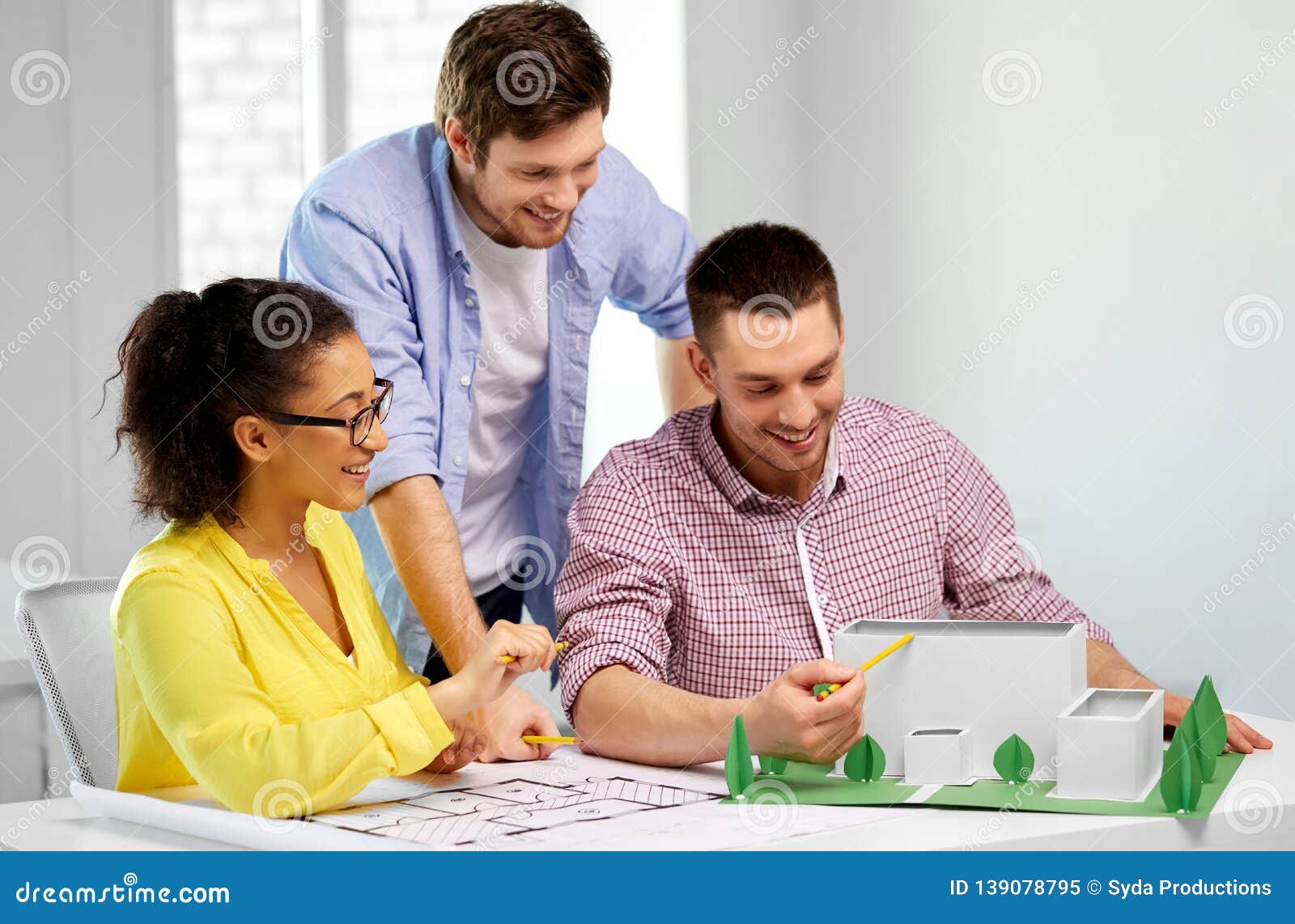 Creative Team with Blueprint Working at Office Stock Image - Image of ...