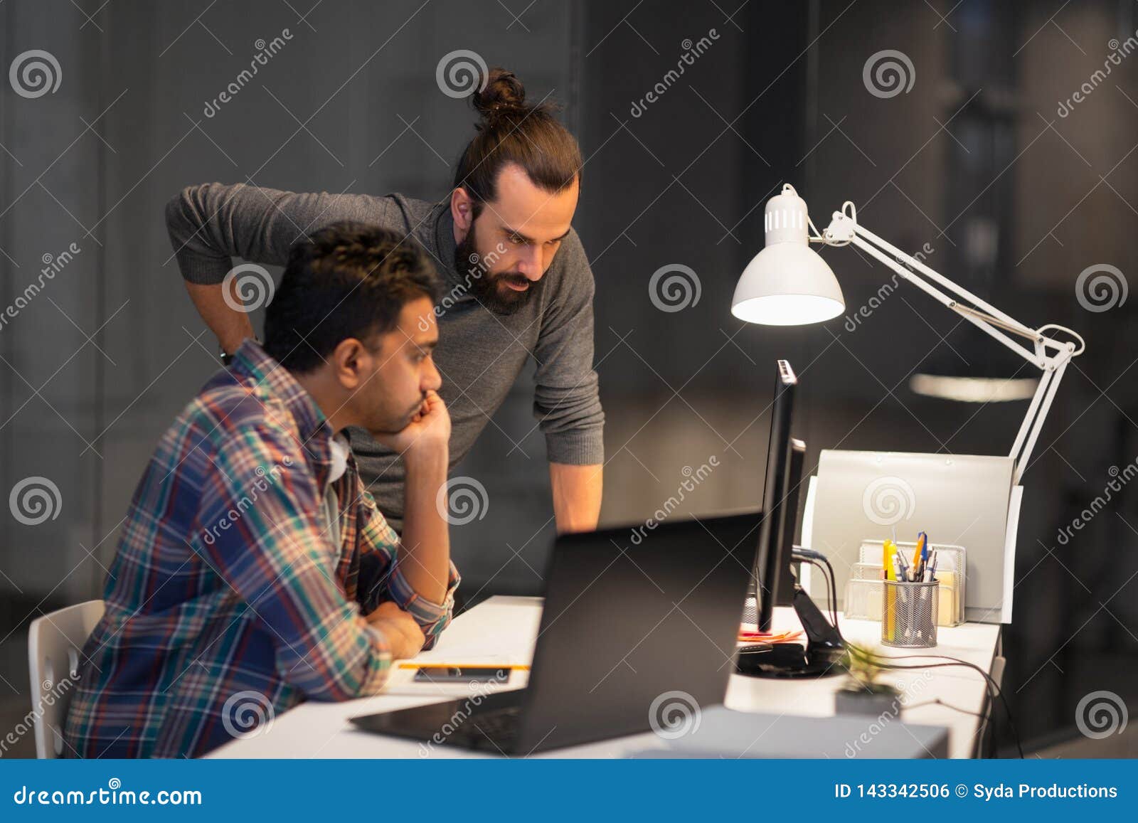 Creative Team with Computer Working Late at Office Stock Photo - Image ...