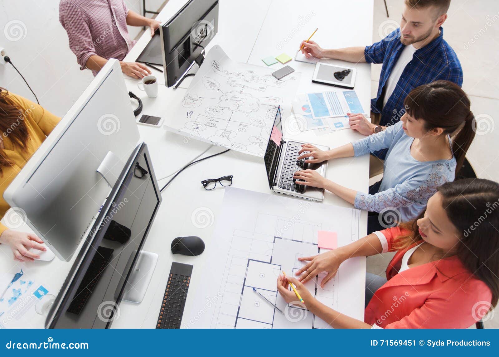 Creative Team with Computers, Blueprint at Office Stock Image - Image ...