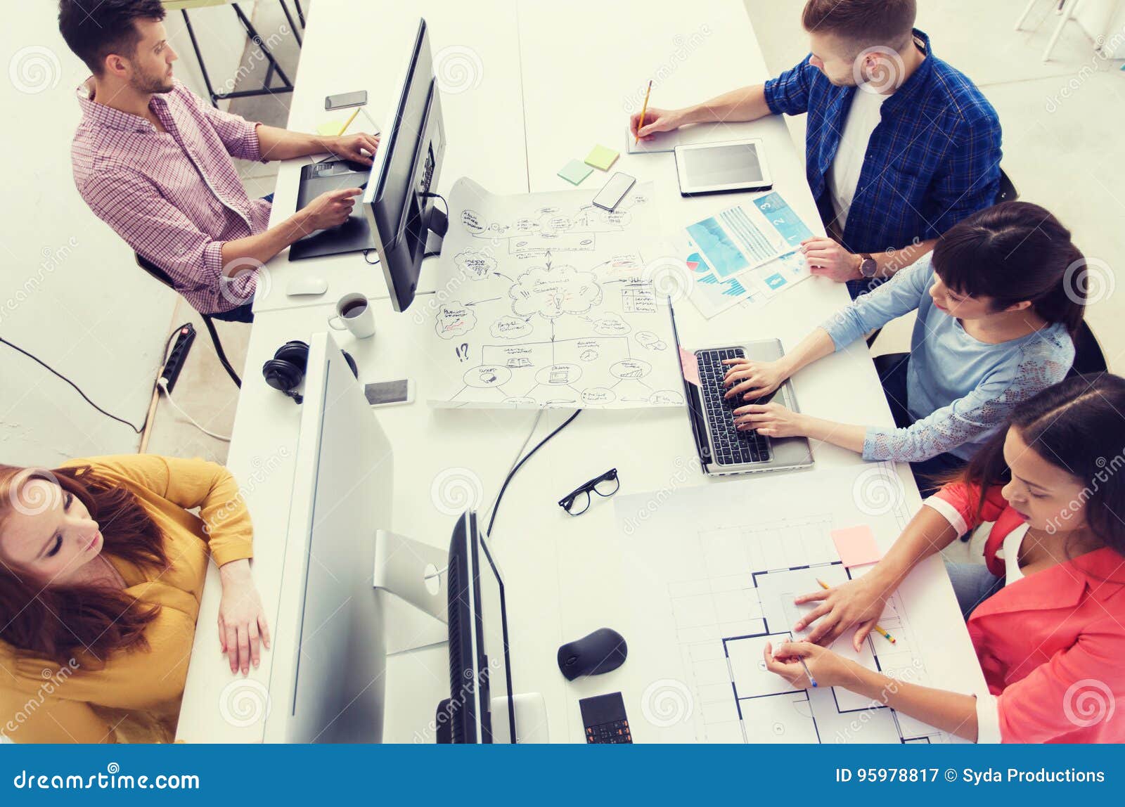 Creative Team with Computers, Blueprint at Office Stock Image - Image ...