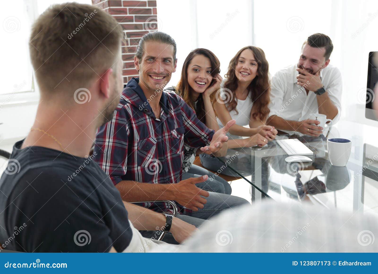 Creative Team Discussing Business Issues Sitting Stock Image - Image of ...