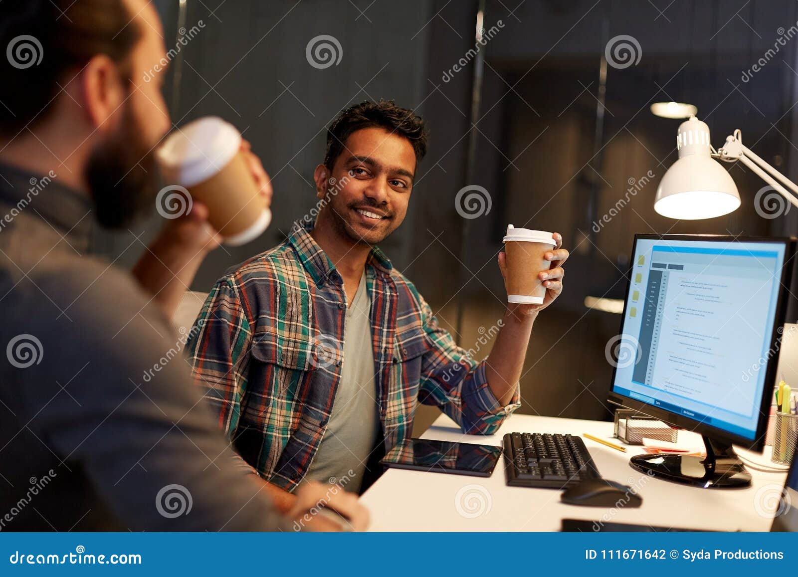 Creative Team Drinking Coffee at Night Office Stock Photo - Image of ...