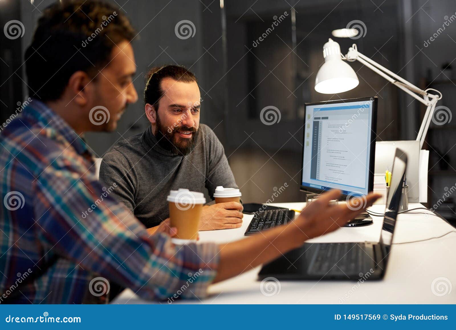 Creative Team Drinking Coffee at Night Office Stock Image - Image of ...