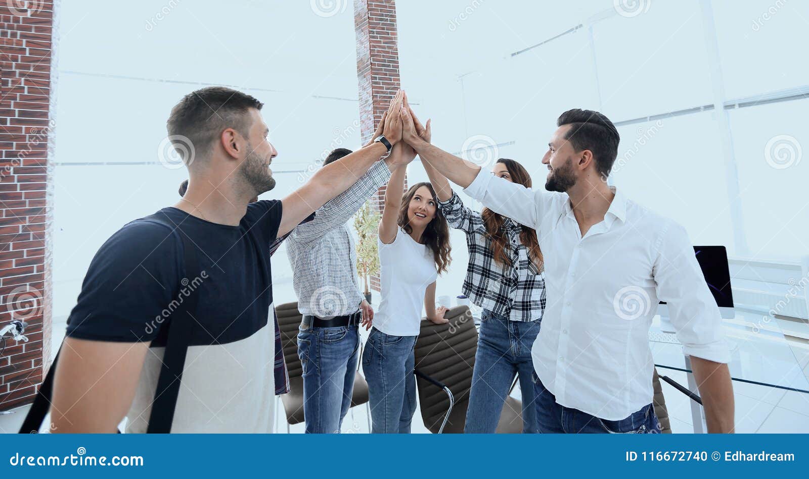 Creative Team Giving Each Other a High Five Stock Photo - Image of ...