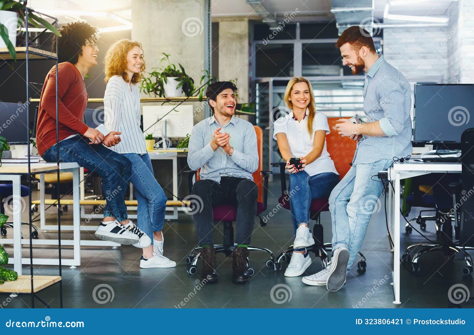 Creative Team Having Discussion on New Design Project in Office Stock ...